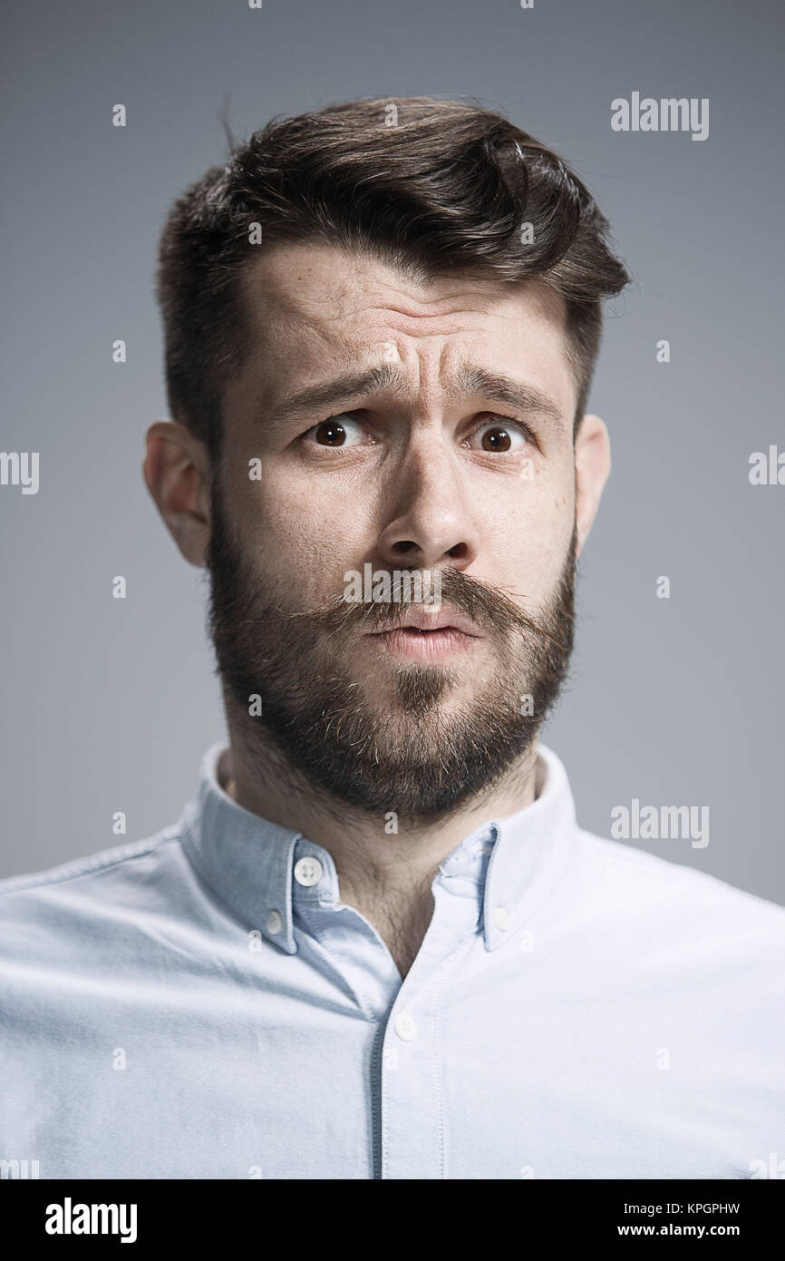Close up face of discouraged man Stock Photo - Alamy