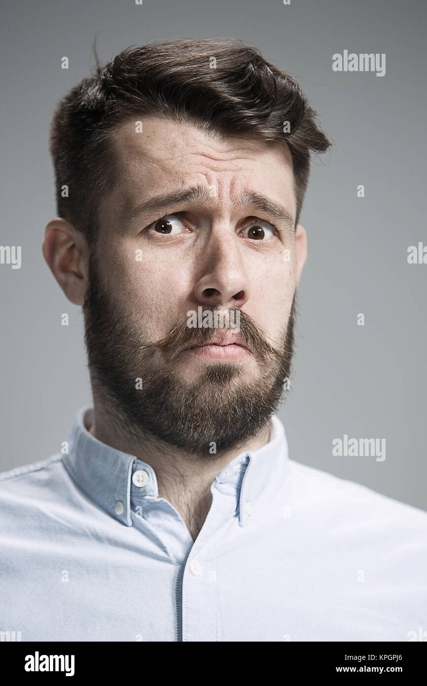 Close up face of discouraged man Stock Photo - Alamy