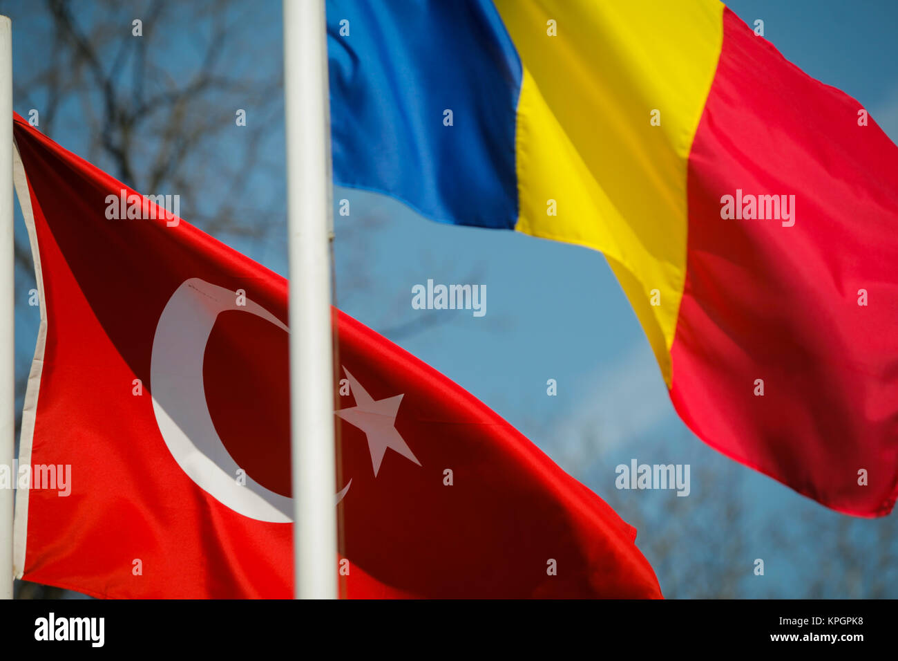 Romania and Turkey national flags wave together in the wind Stock Photo ...