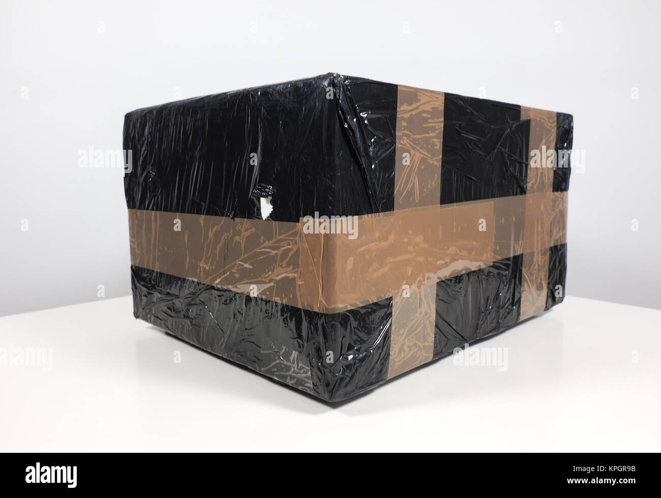 Black packet hi-res stock photography and images - Alamy