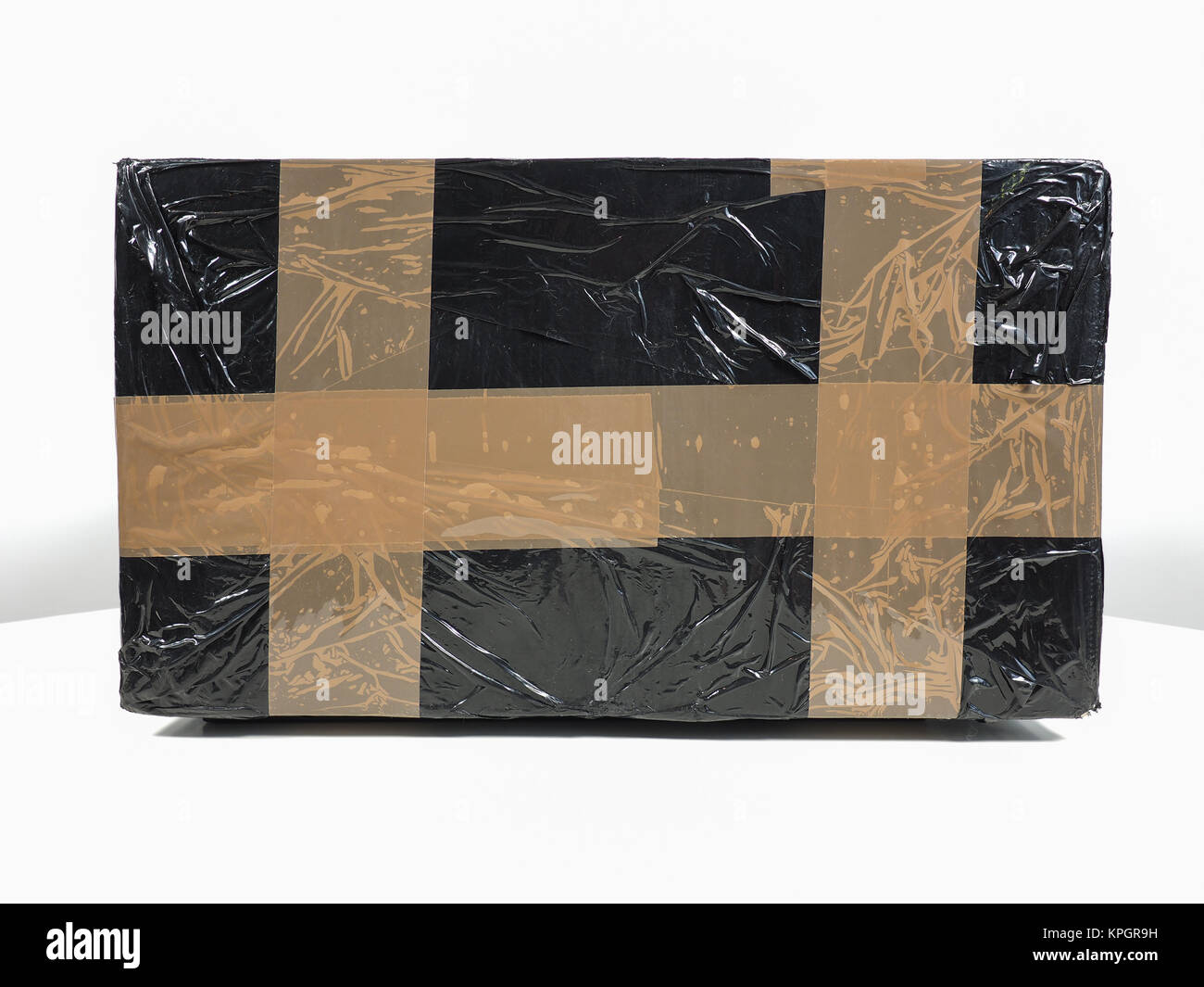Black packet parcel Stock Photo - Alamy