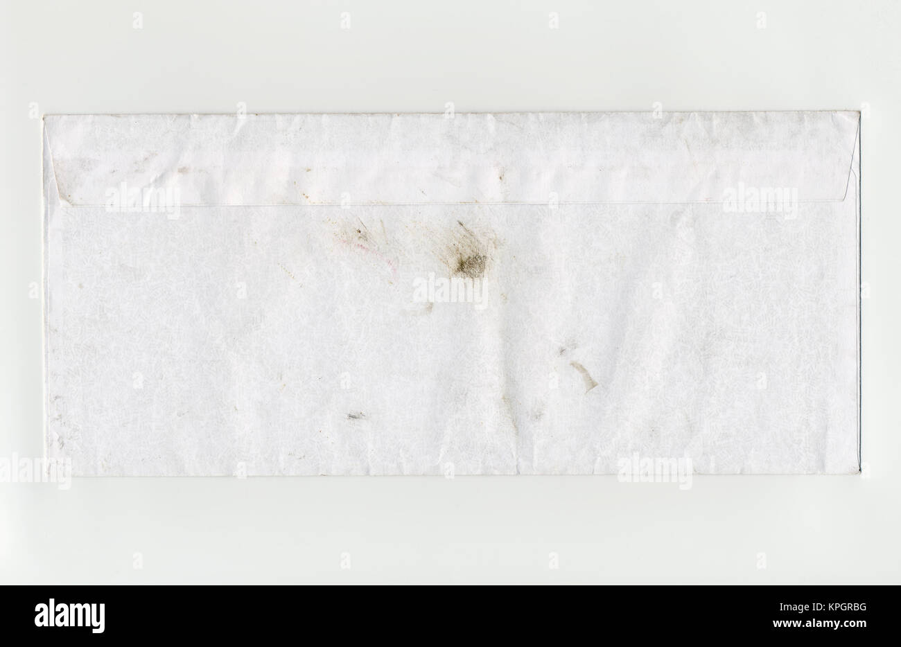 Dirty white letter envelope Stock Photo - Alamy