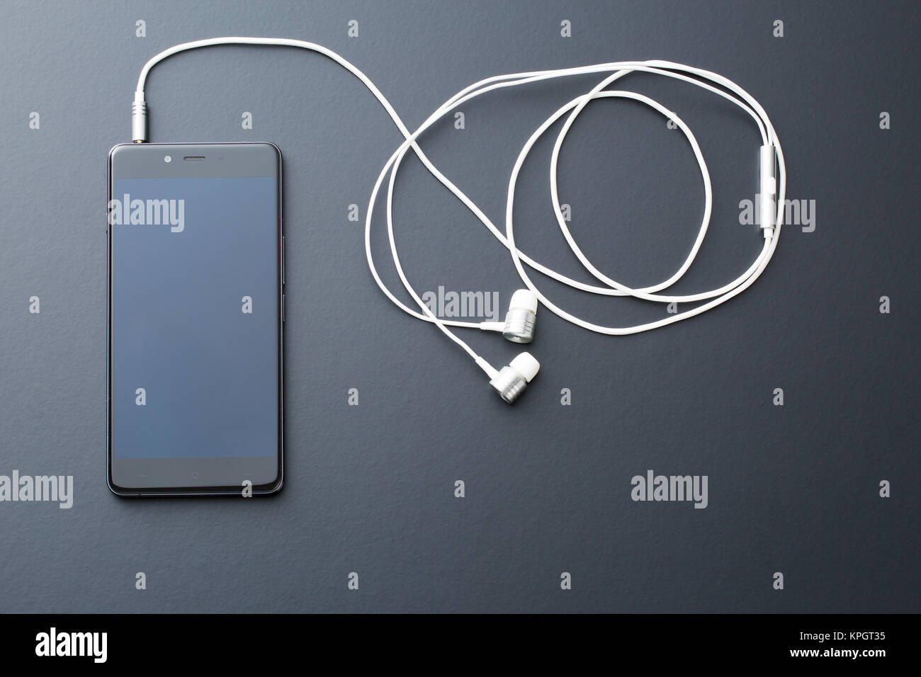 earphones and cellphone Stock Photo - Alamy