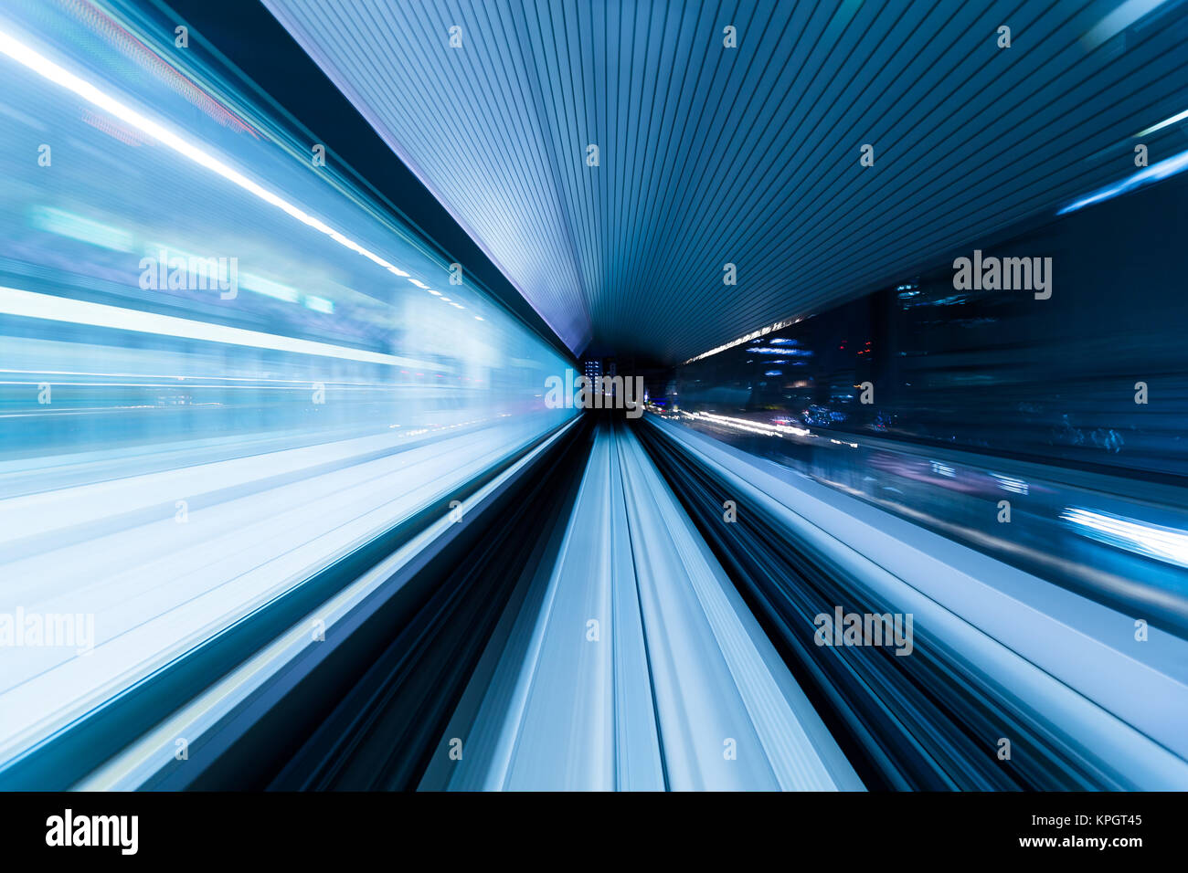 Speedy train moving in tunnel Stock Photo - Alamy