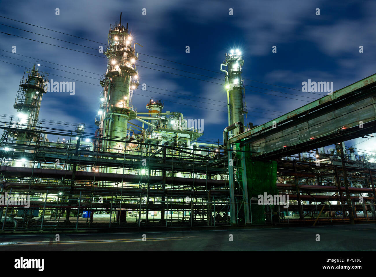 Oil refinery at night Stock Photo - Alamy
