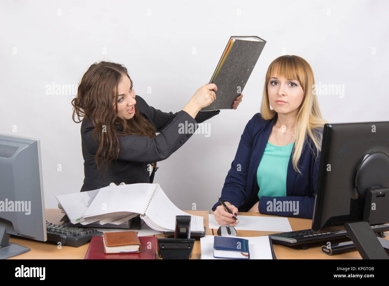 Two Women Fighting In Office Stock Photos & Two Women Fighting In ...