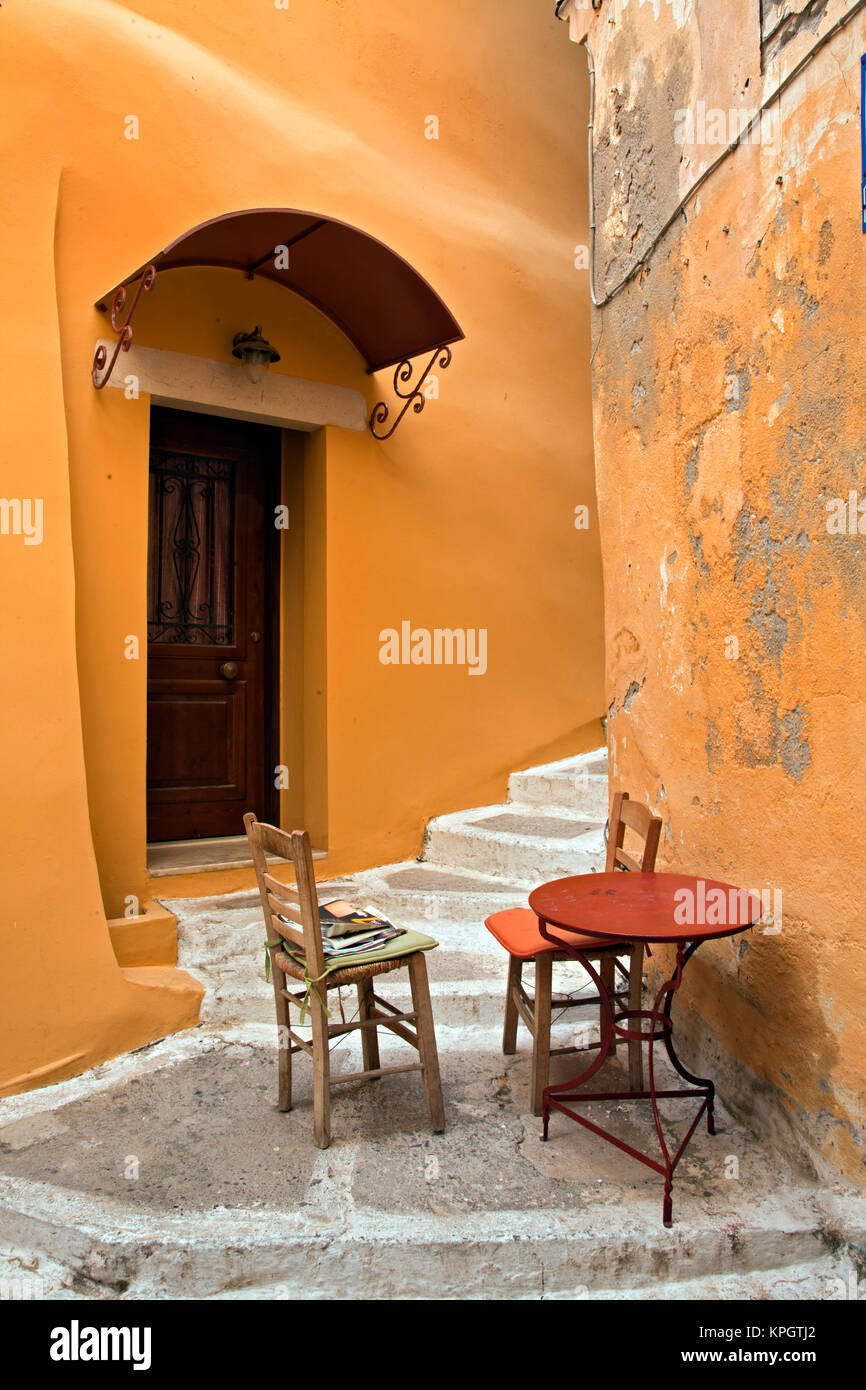 Sidewalk table setting, Chania, Crete, Greece Stock Photo - Alamy