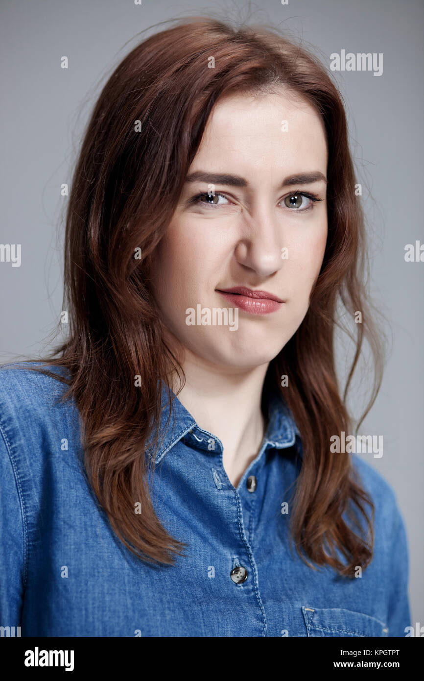 portrait of disgusted woman Stock Photo - Alamy