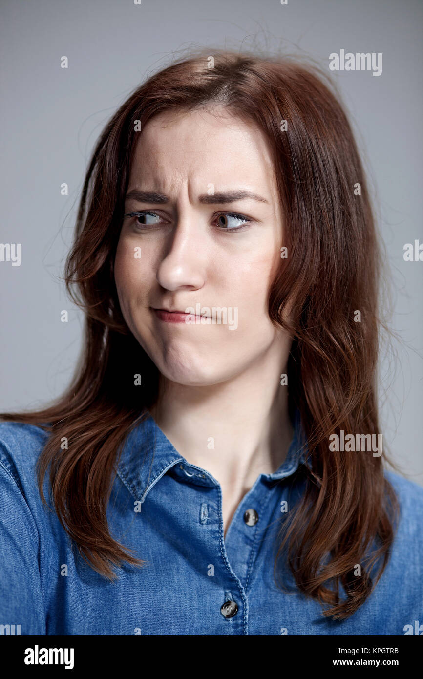portrait of disgusted woman Stock Photo - Alamy