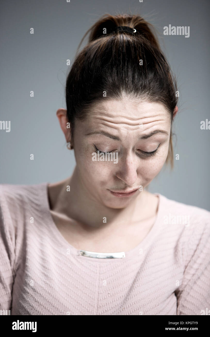 The portrait of a beautiful sad girl closeup Stock Photo - Alamy