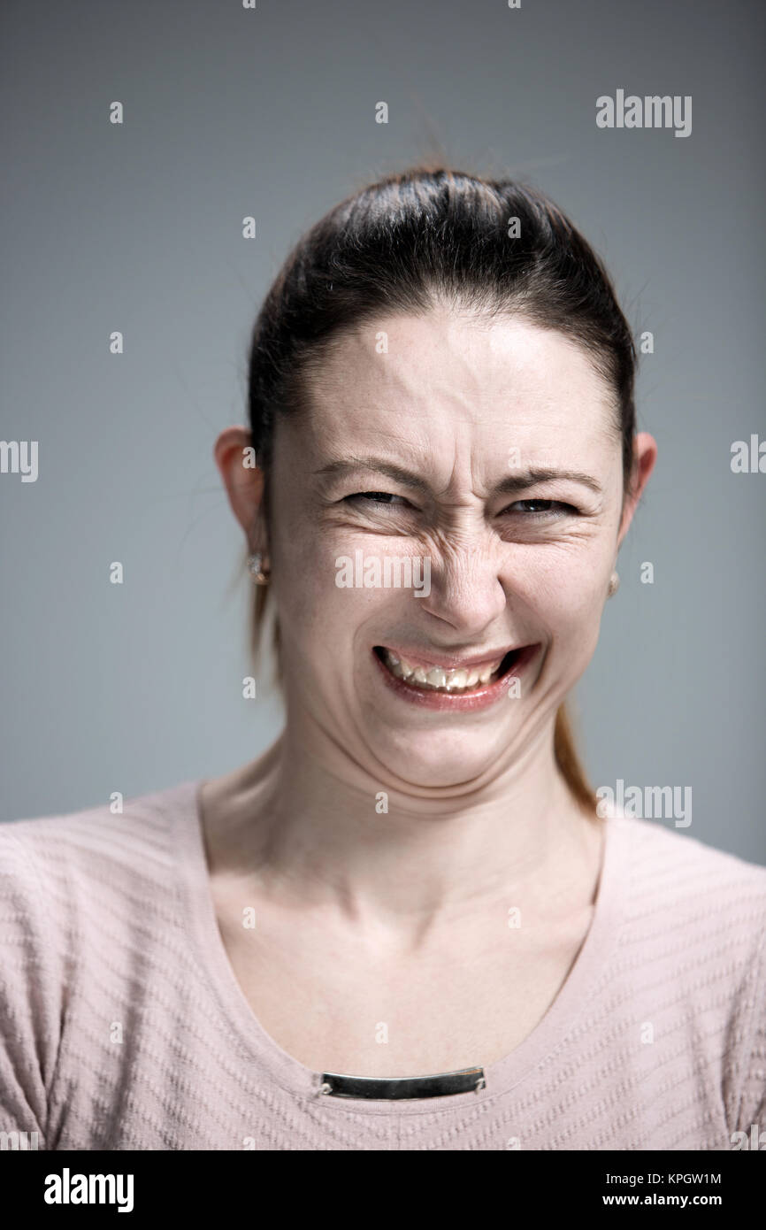 portrait of disgusted woman Stock Photo - Alamy