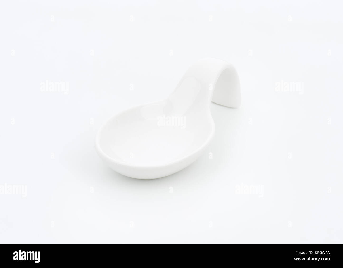 white porcelain spoon Stock Photo - Alamy
