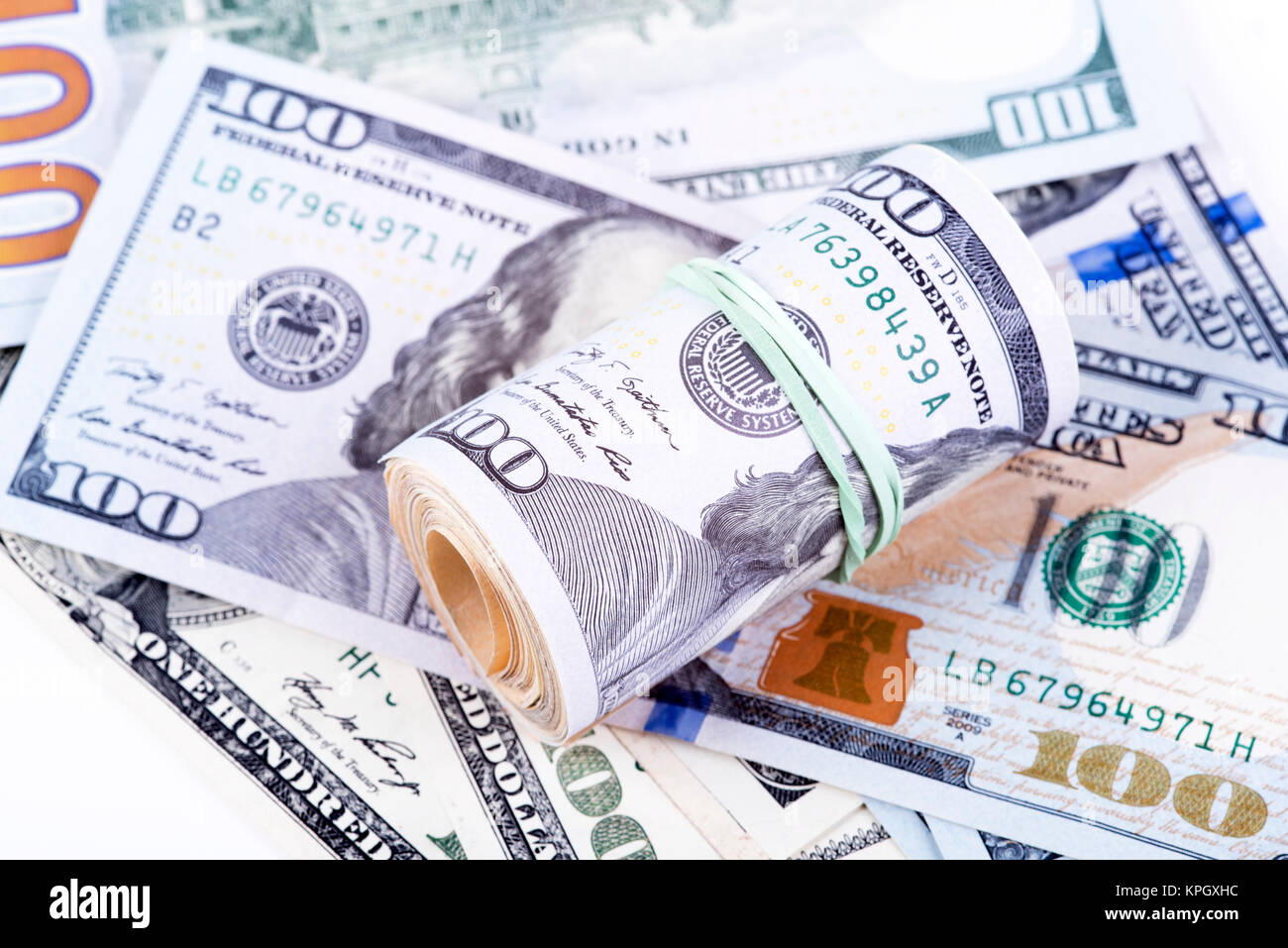pictures of dollar banknotes on a white background Stock Photo - Alamy