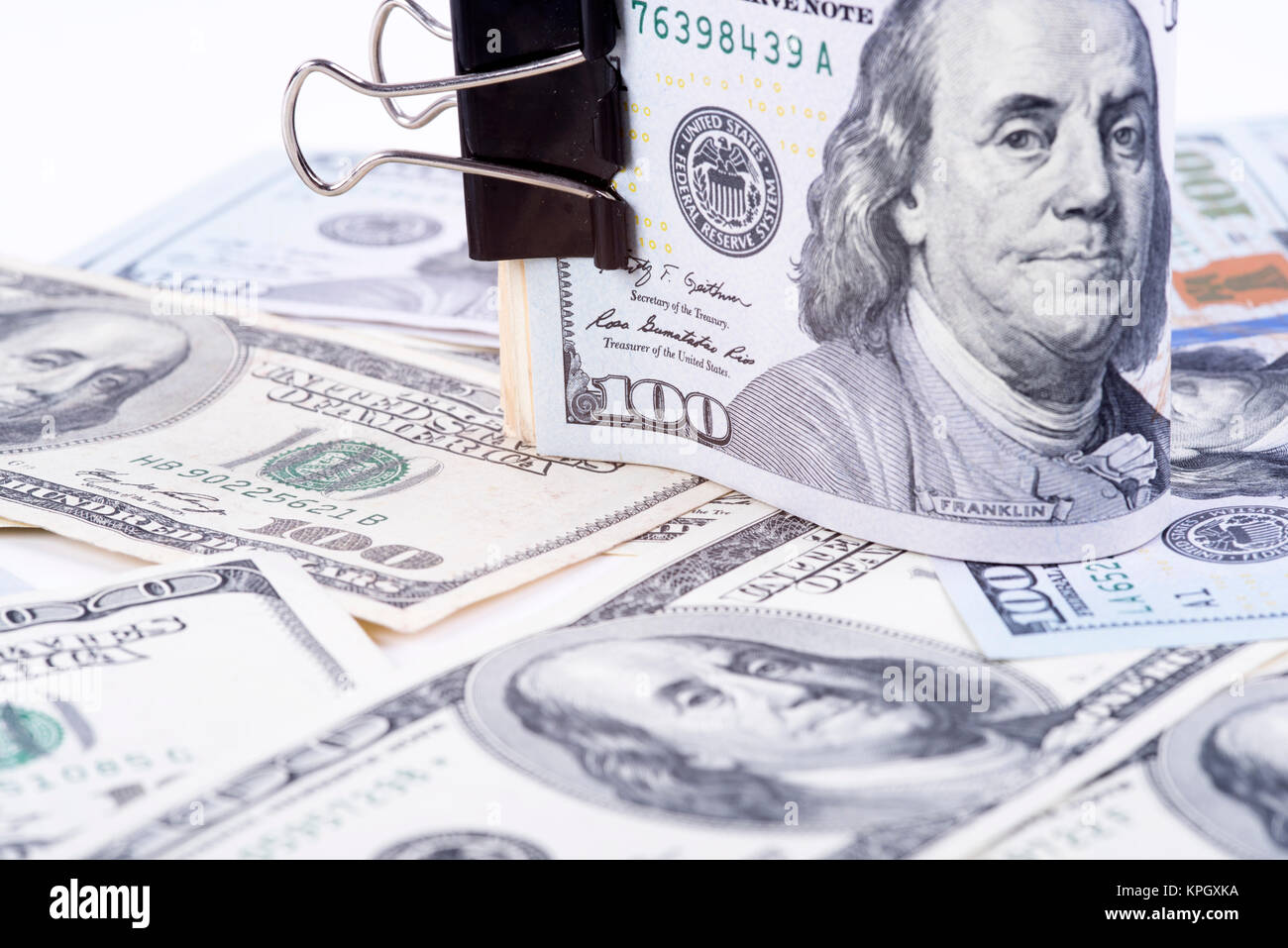 pictures of dollar banknotes on a white background Stock Photo - Alamy