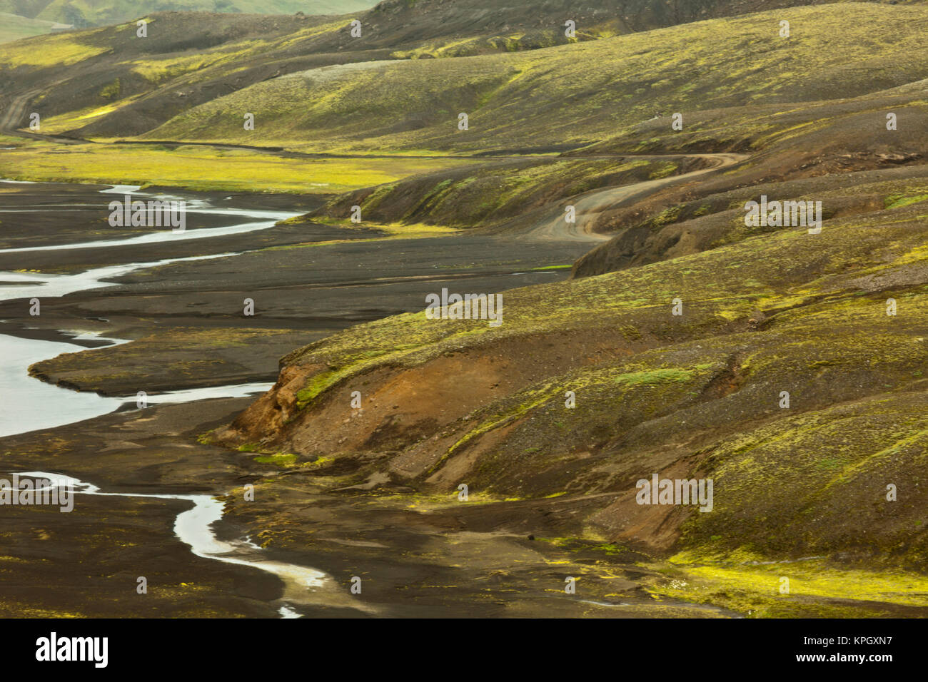 Glacial stream running through mountains, Iceland Stock Photo - Alamy