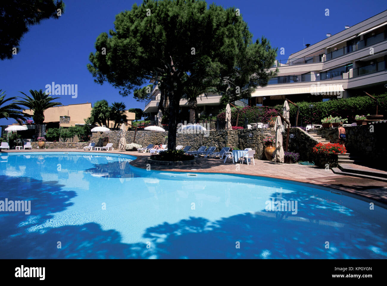 Italy, Tuscany, Punta Ala. Poolside view at Tuscan coastal resort Stock ...