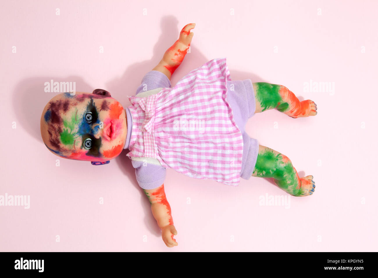 a doll transformed into a monster by the marker scribbles of a child ...