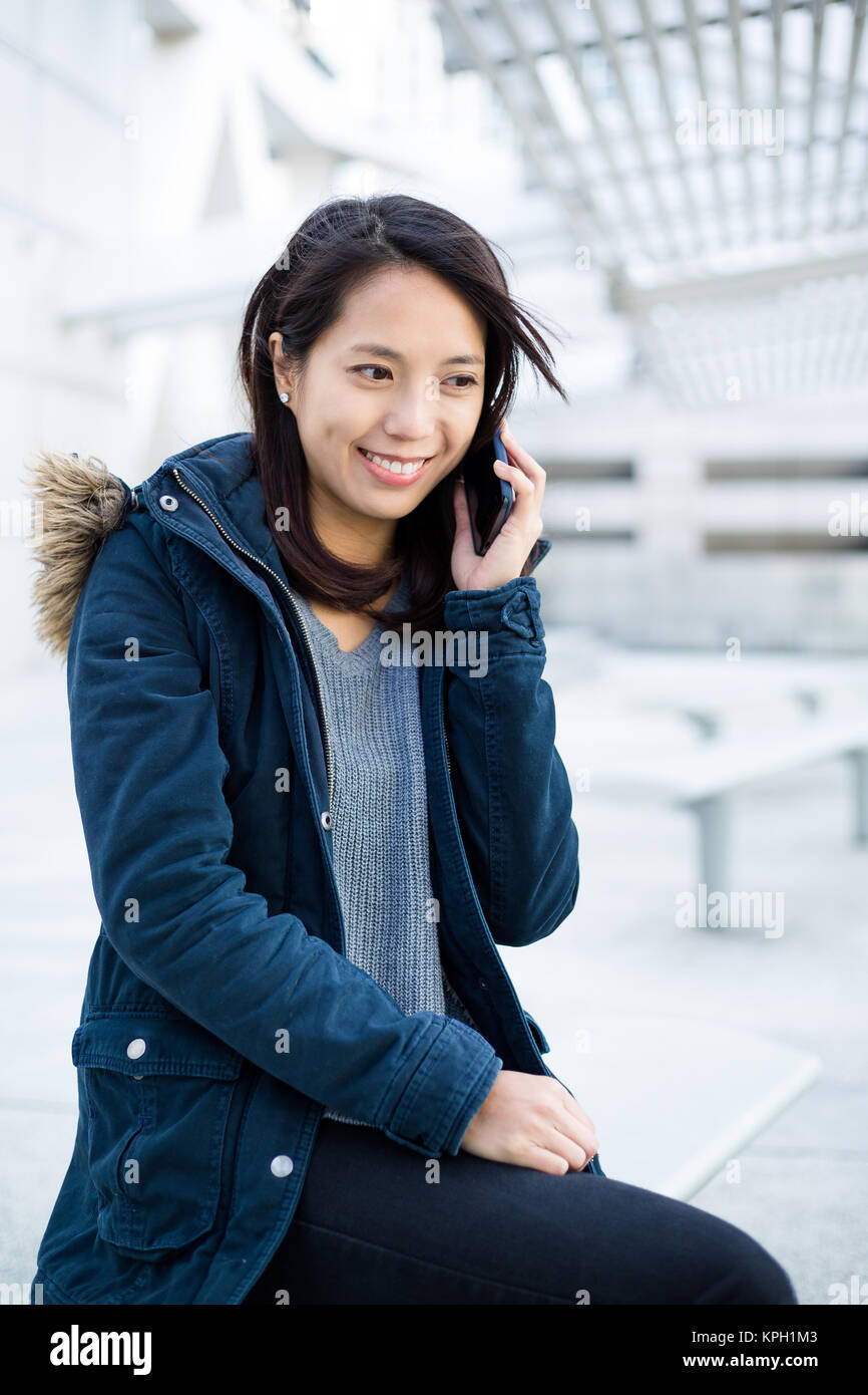Woman enjoy talk to cellphone Stock Photo - Alamy