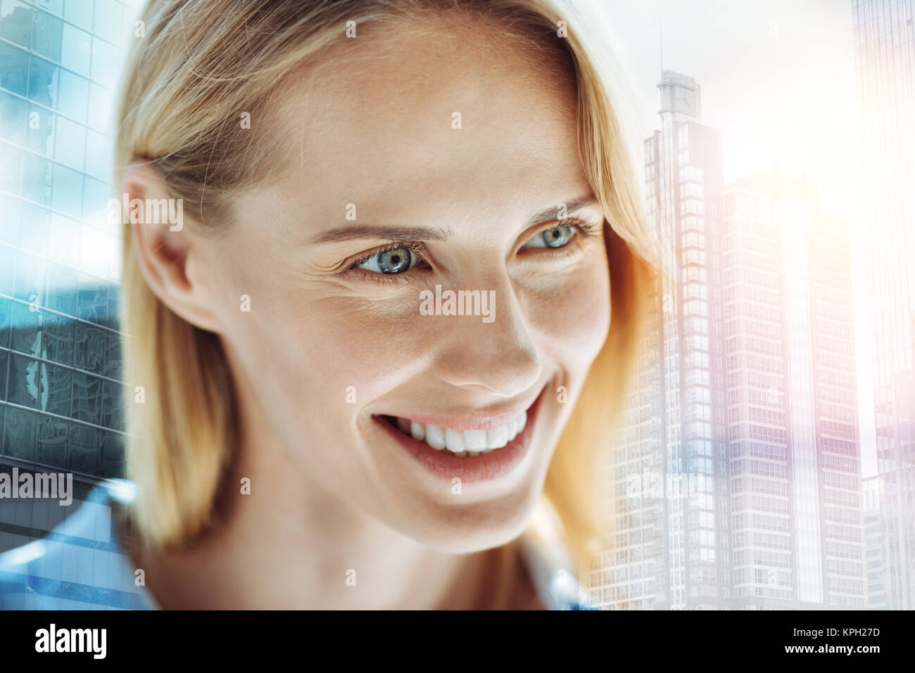 Happy satisfied lady feeling good herself and looking aside Stock Photo ...