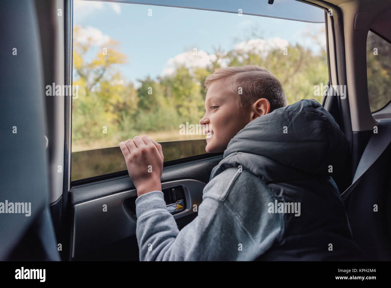 happy little boy in car Stock Photo - Alamy
