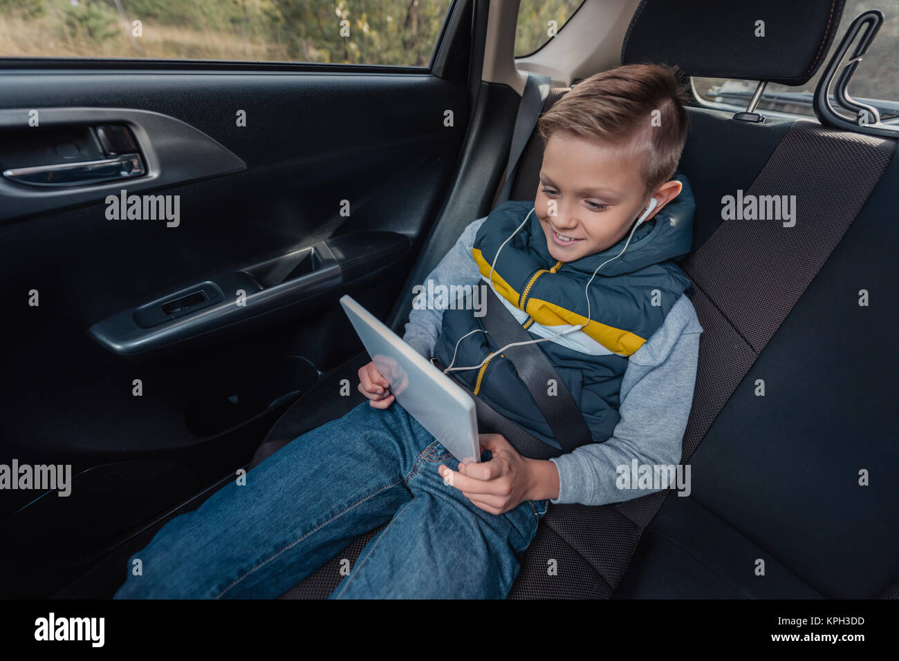 Child tablet car hi-res stock photography and images - Alamy