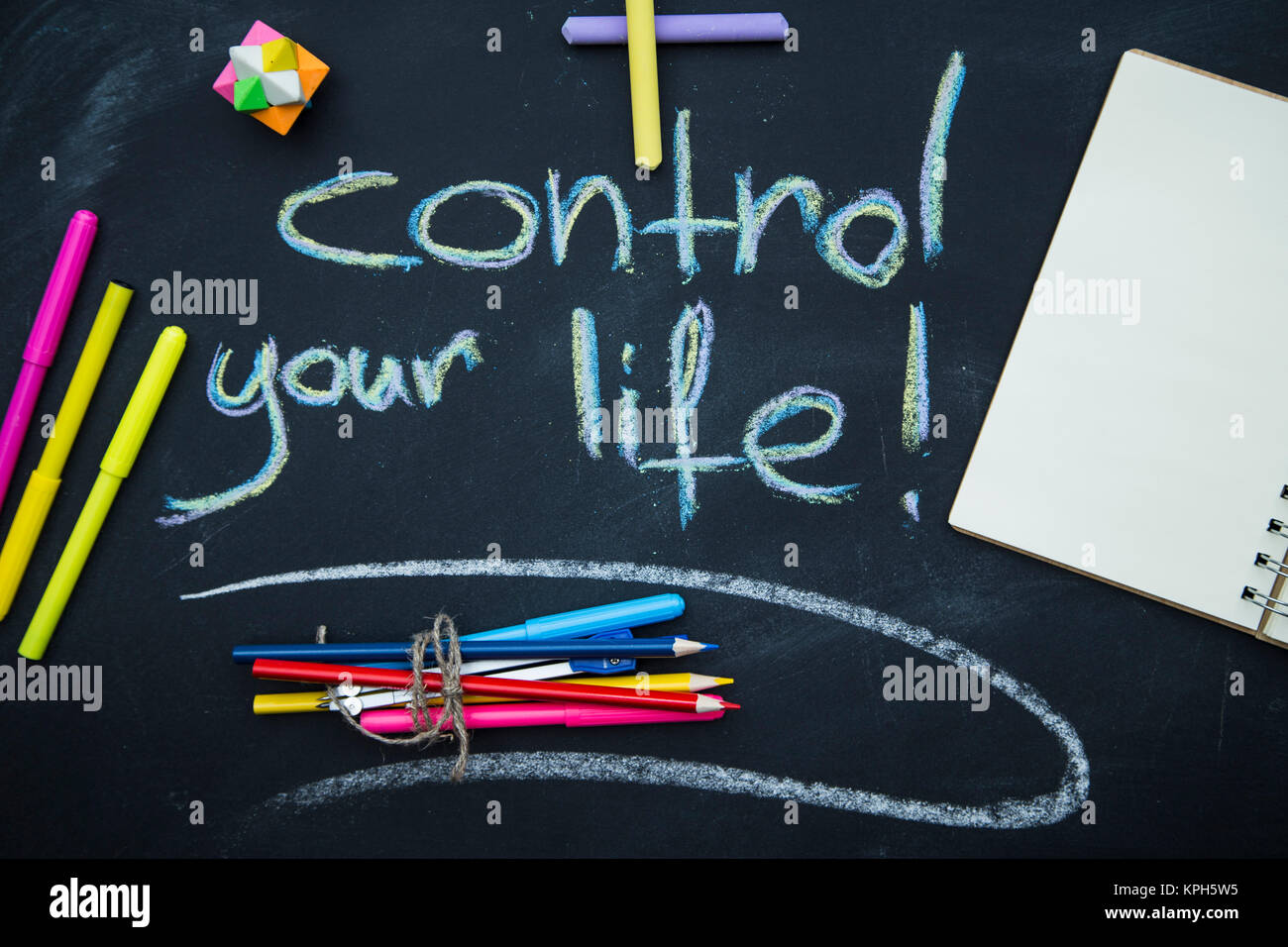Motivation words. Control your life inscription on a blackboard written ...
