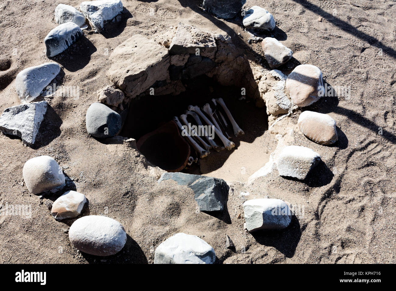 Bones in open inca cemetery in Nazca region , Peru Stock Photo - Alamy