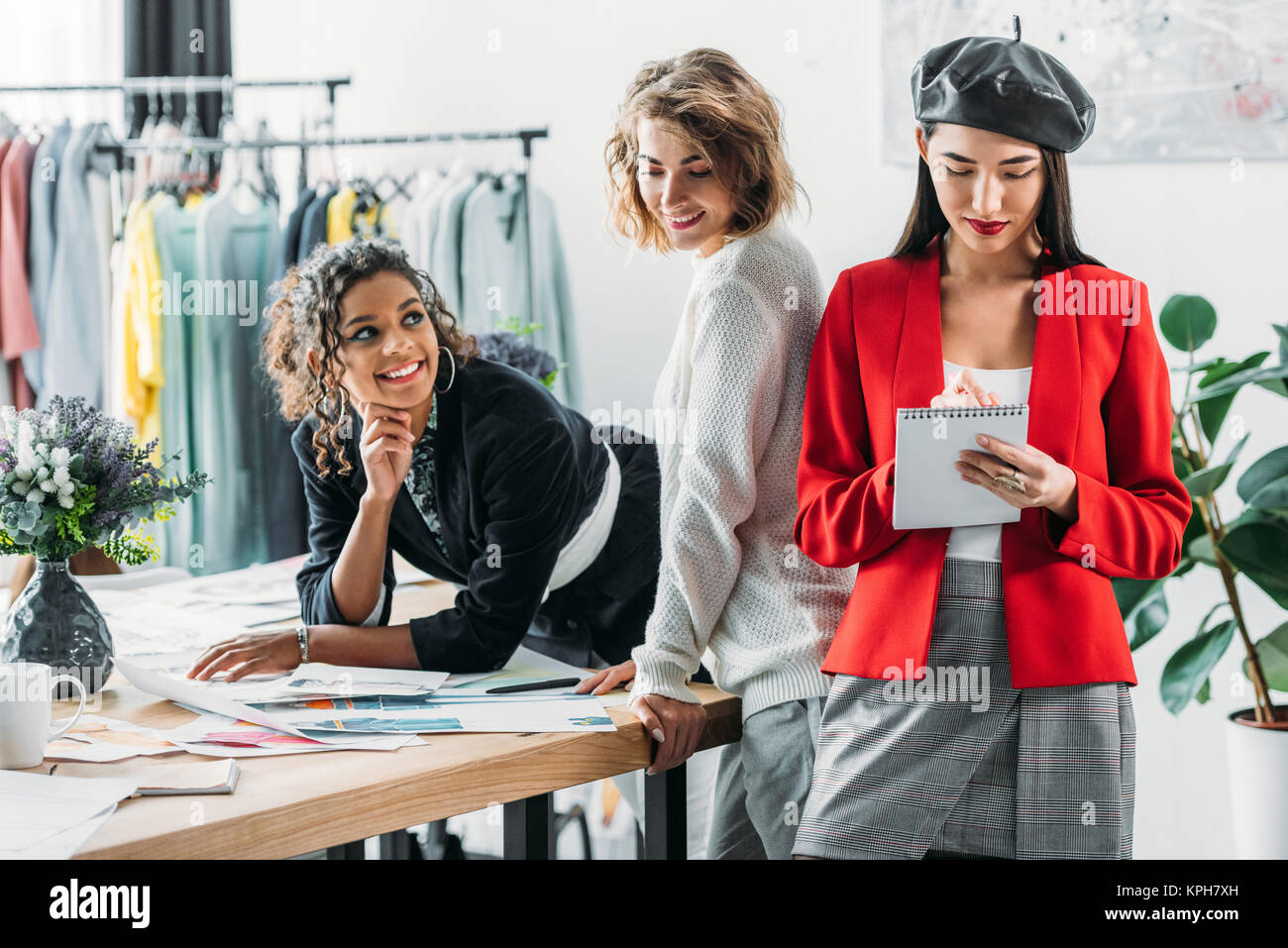 multiethnic fashion designers working together Stock Photo - Alamy
