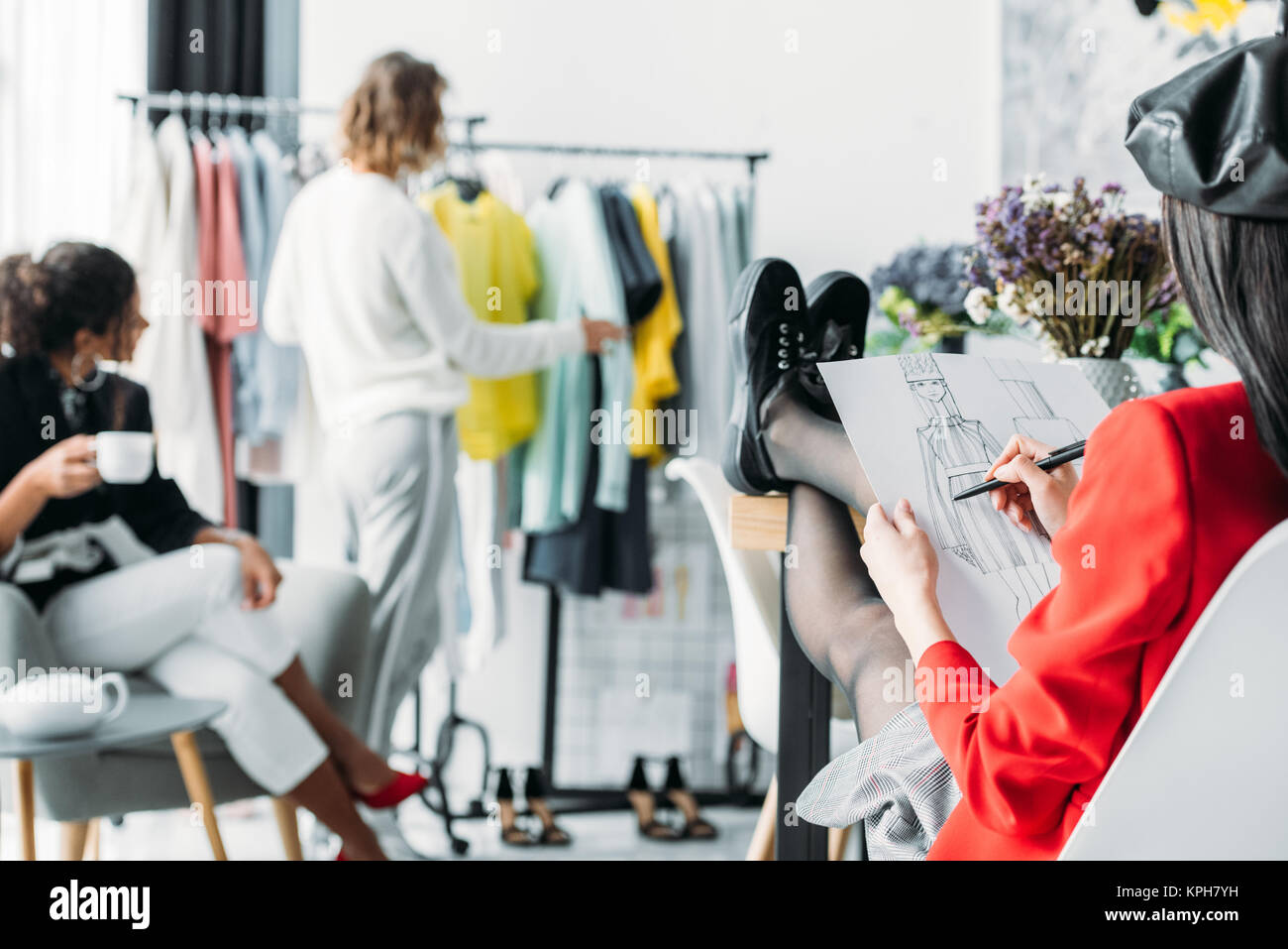 fashion designer drawing sketch Stock Photo - Alamy