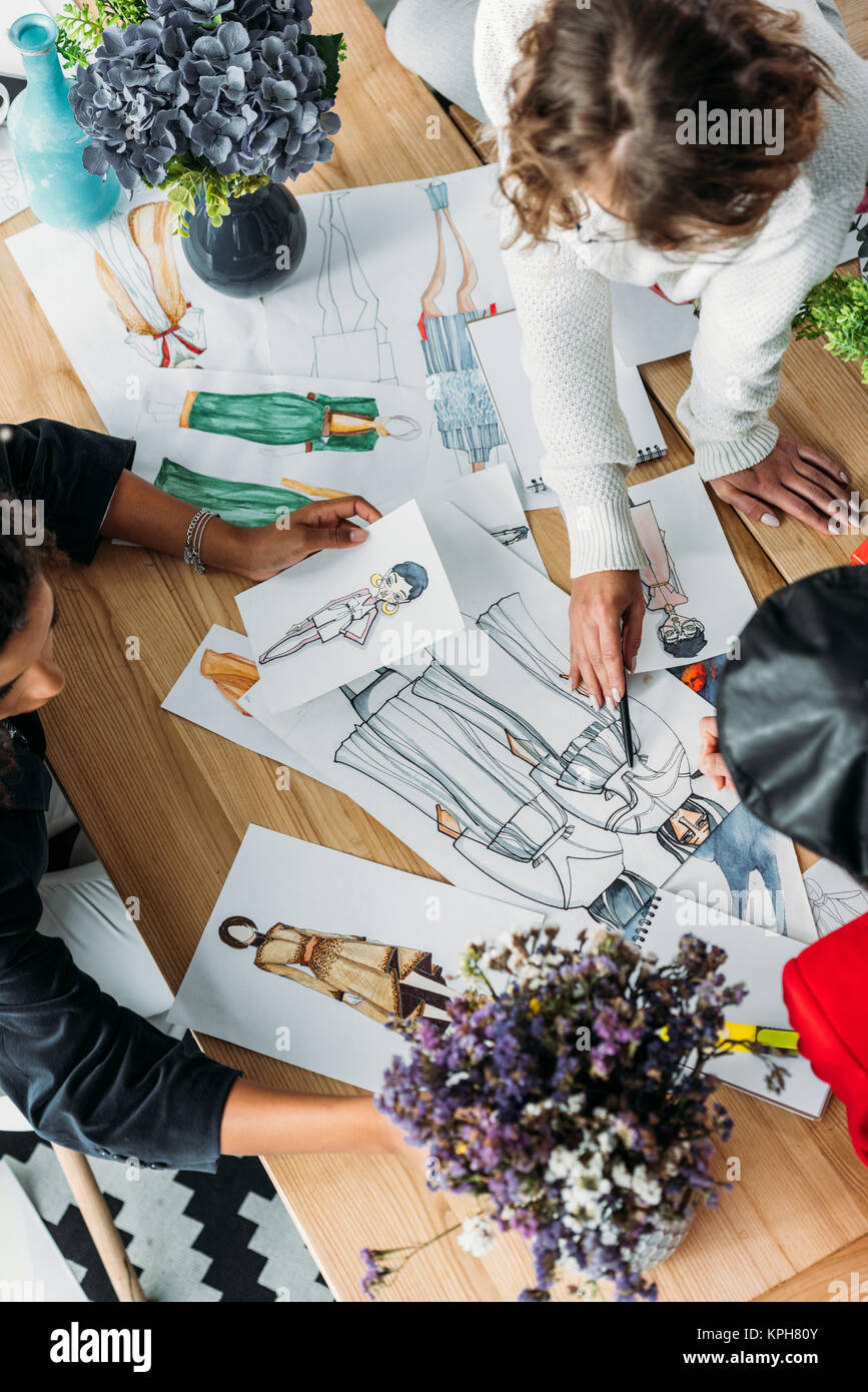 fashion designers working with sketches Stock Photo - Alamy