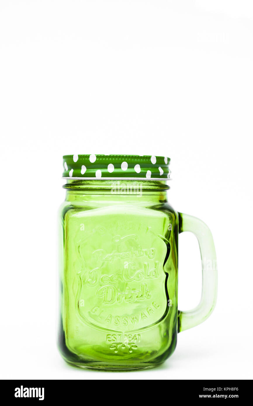 Green mason glass on white background Stock Photo - Alamy
