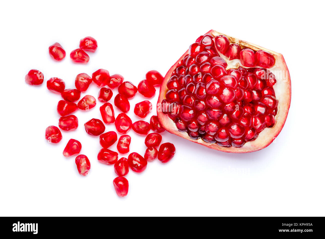 Pomegranate and seeds close-up Stock Photo - Alamy