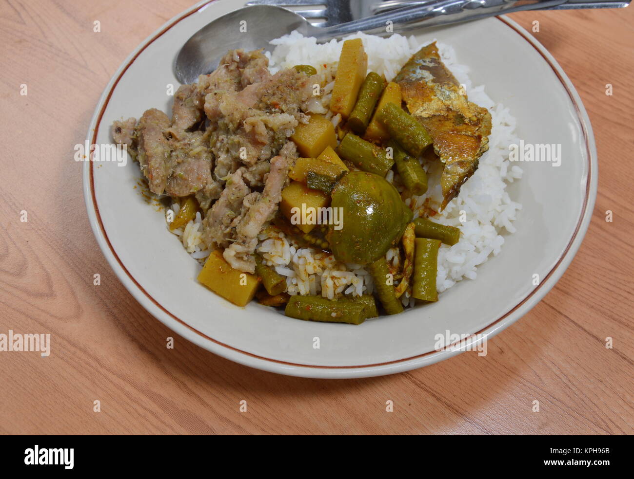 fish organs sour soup and fried pork on rice Stock Photo - Alamy