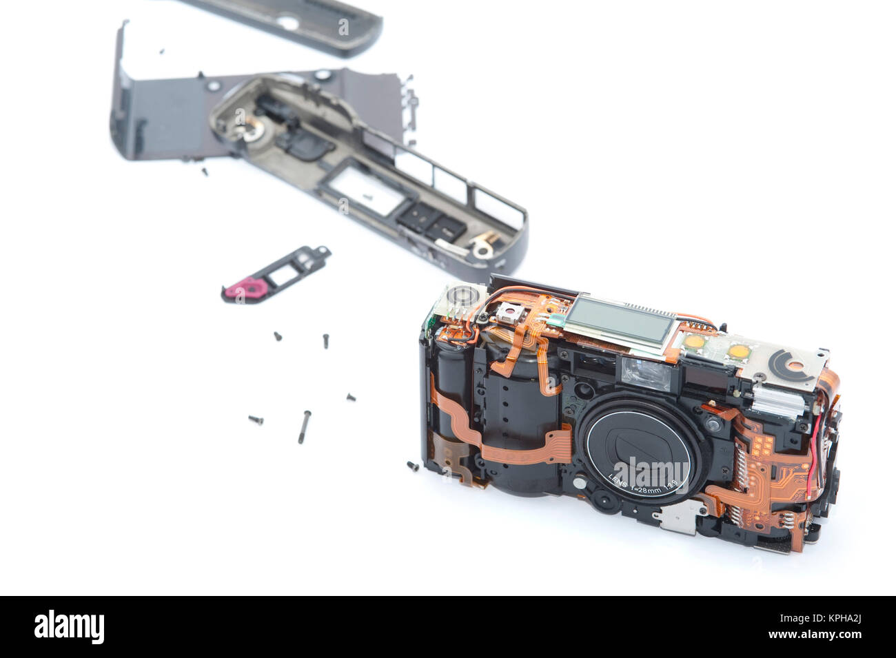 Exploded camera laying on white background Stock Photo - Alamy