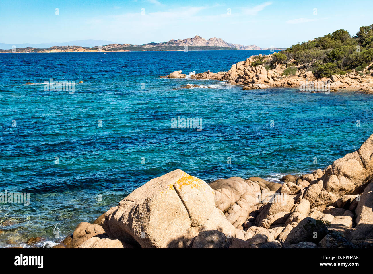Picturesque Granite Coastline & Isola Caprera With Blue Sky – Baia ...