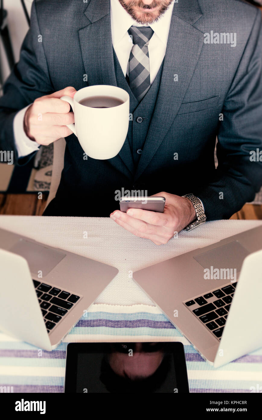 Portrait professional business man with coffee working with multiple ...