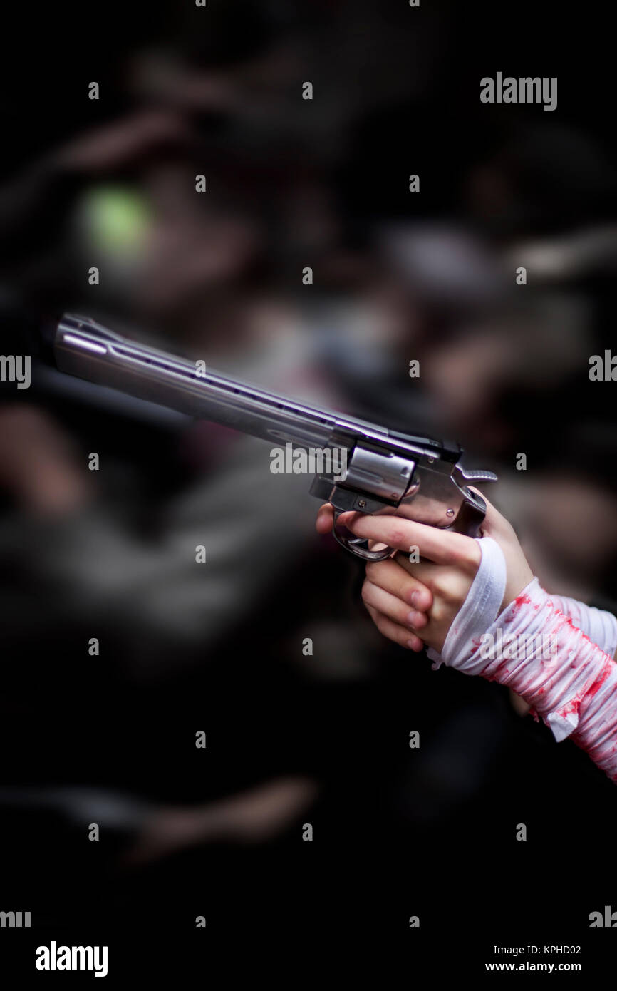 Gun in the street Stock Photo - Alamy