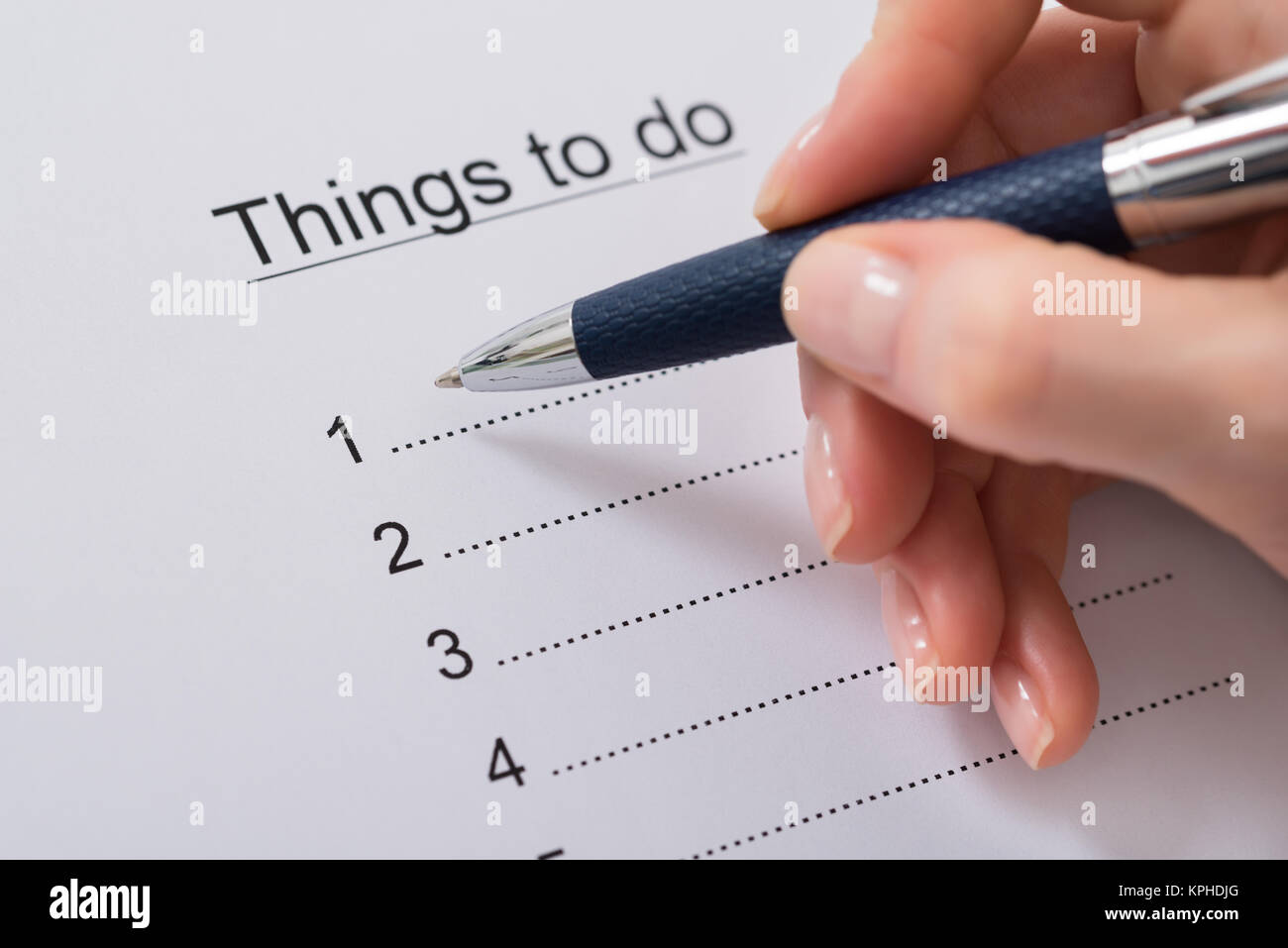 Woman Hand Writing Things To Do List Stock Photo - Alamy