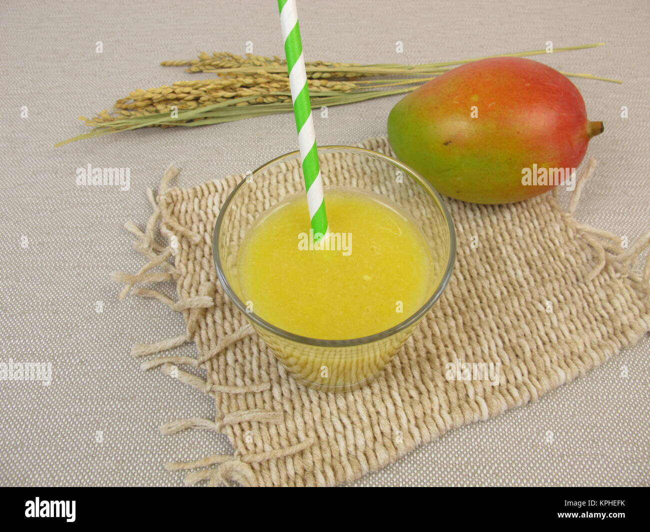 Mango Smoothie with Rice Milk Stock Photo - Alamy