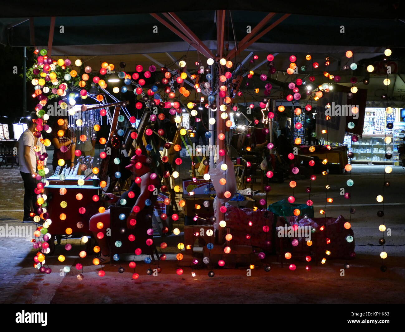 Coloured lights on a stall at night in Athens Greece Stock Photo - Alamy