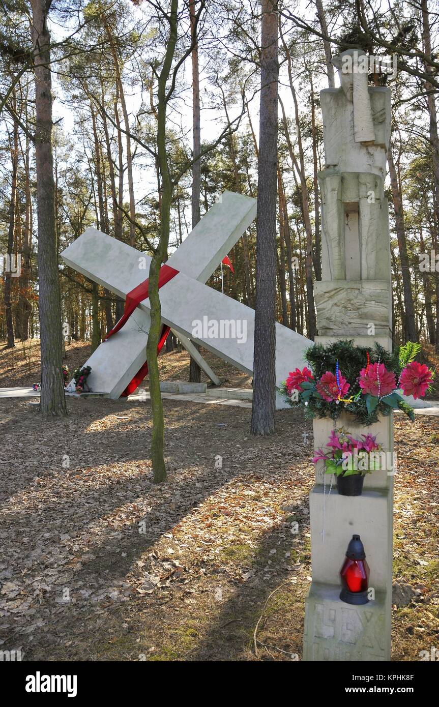 Overturned cross and stone, monuments at the place where Jerzy ...