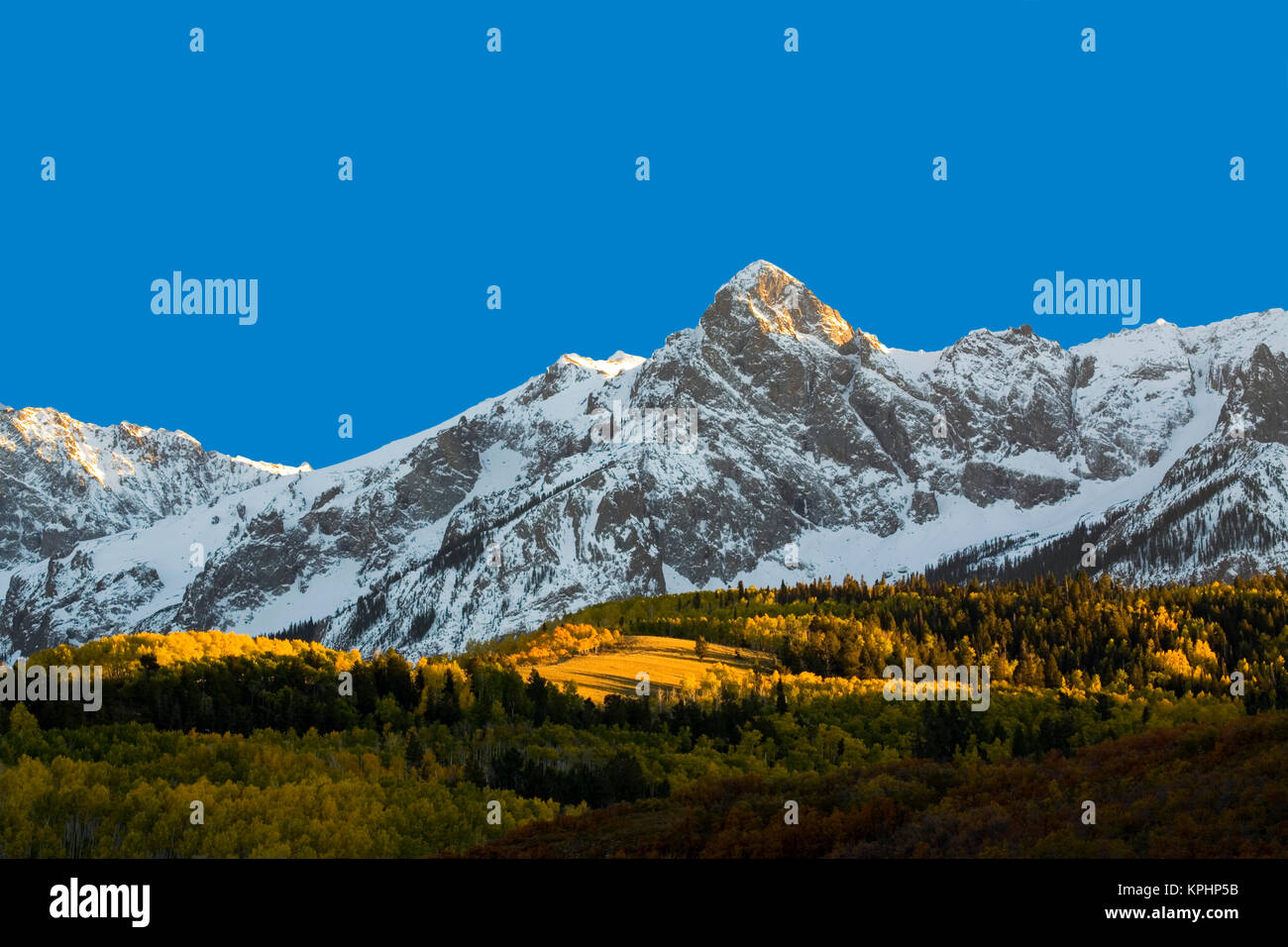 USA, Colorado, Dallas Divide, Sunset on Mt. Sneffles with Autumn Color ...