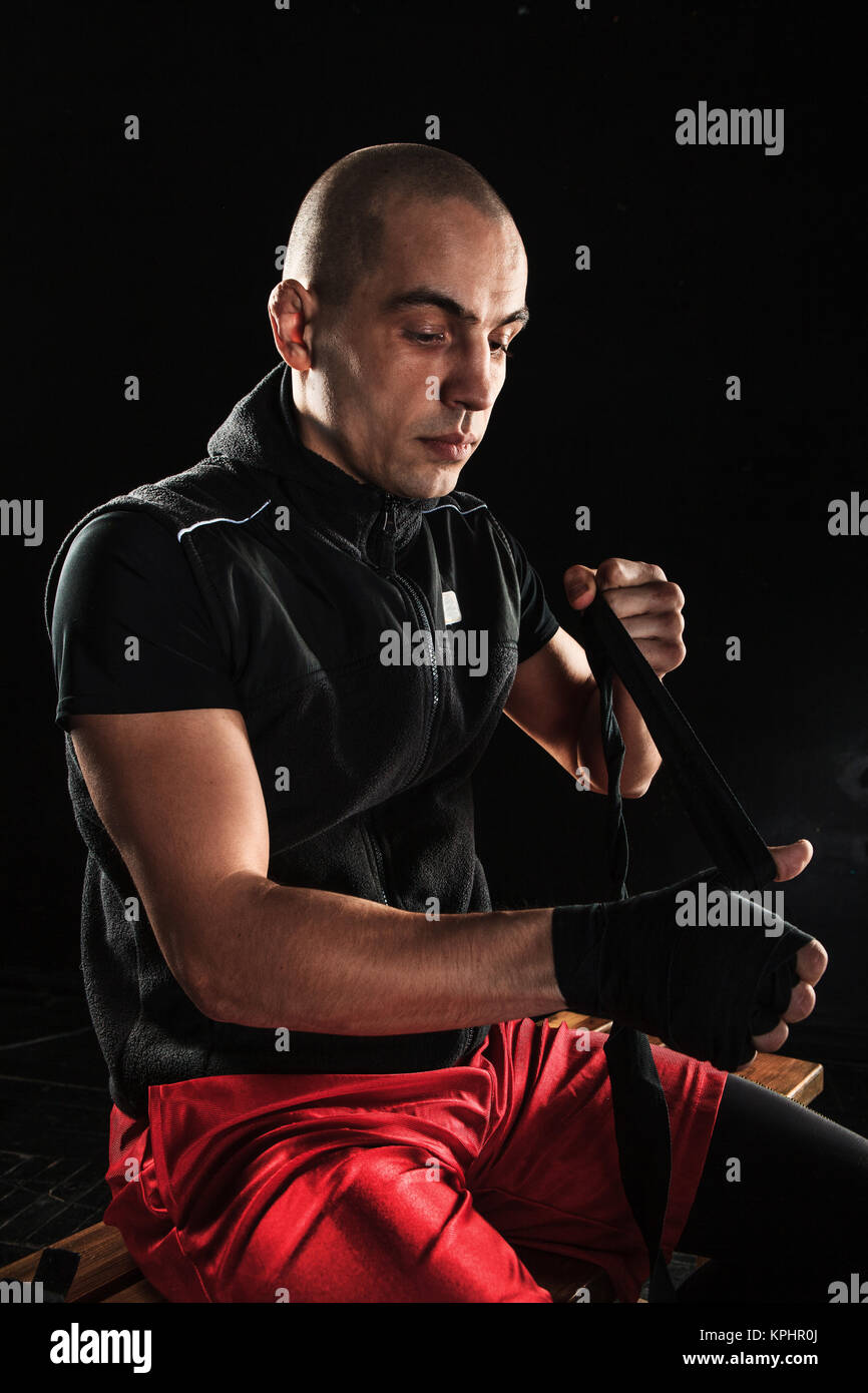 The hands of muscular man with bandage Stock Photo - Alamy
