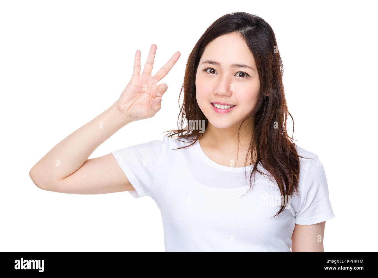 Asian young woman showing ok sign gesture Stock Photo - Alamy