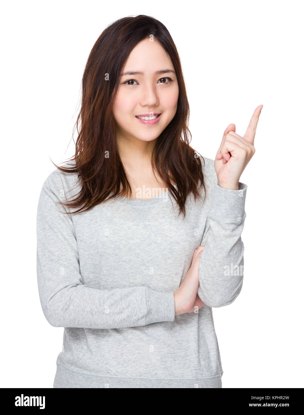 Woman with finger point up Stock Photo - Alamy