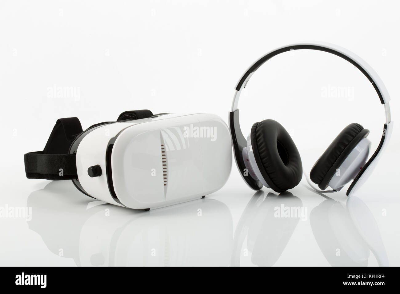 virtual reality glasses and headphones Stock Photo - Alamy