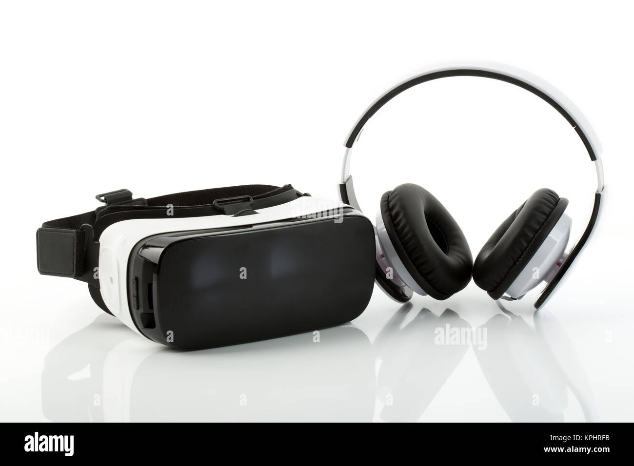virtual reality glasses and headphones Stock Photo - Alamy