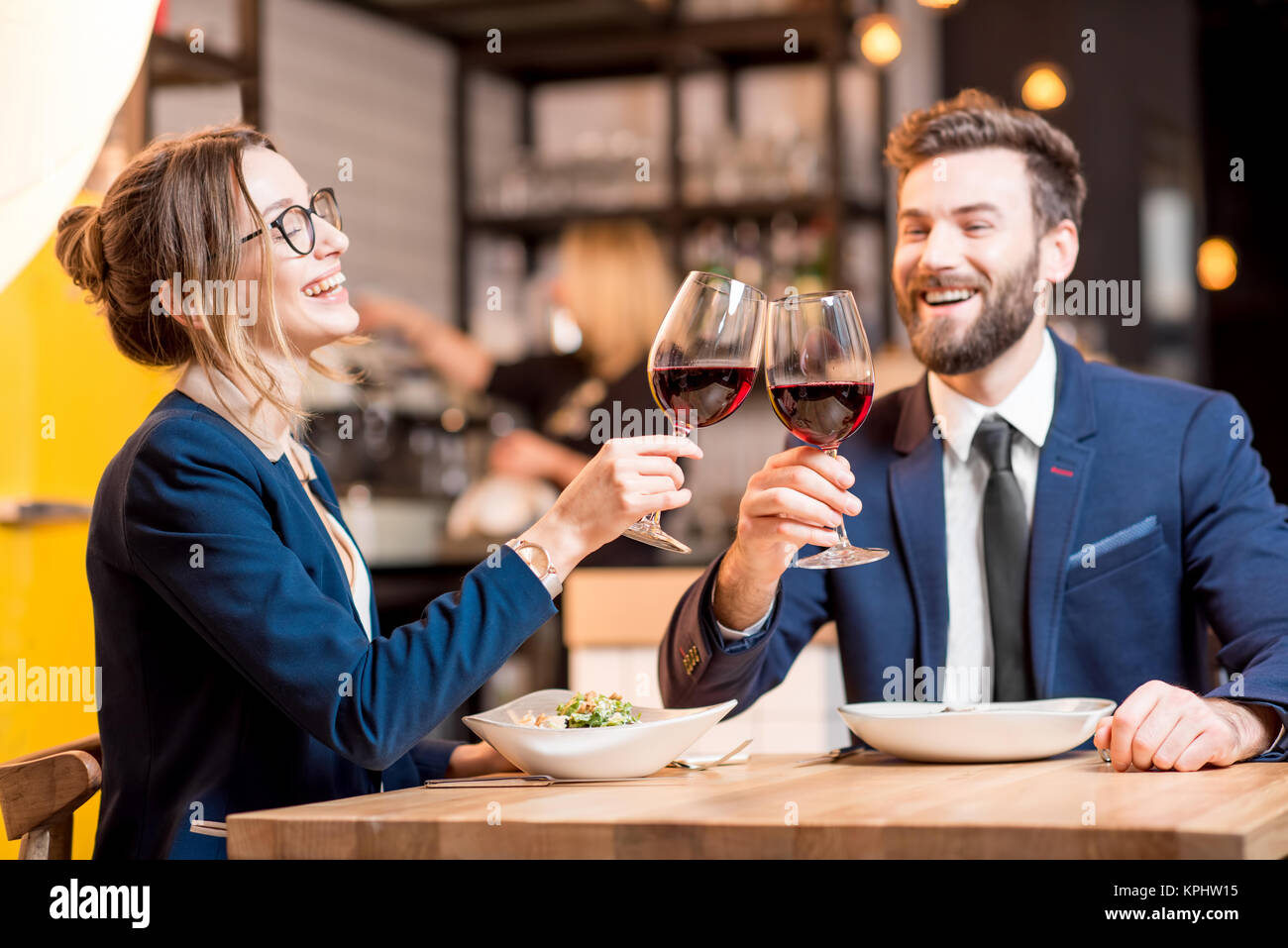Successful business people drink wine hi-res stock photography and ...