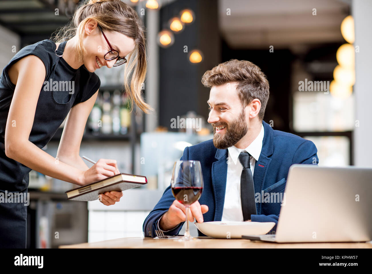 Waitress restaurant taking order hi-res stock photography and images ...