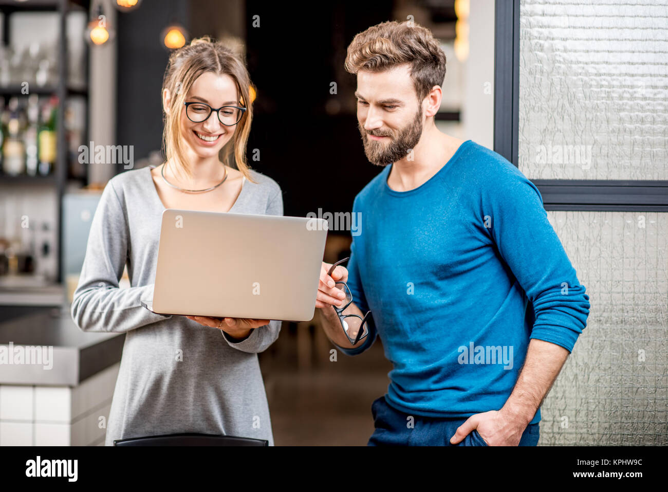 Business partners working modern technology hi-res stock photography ...